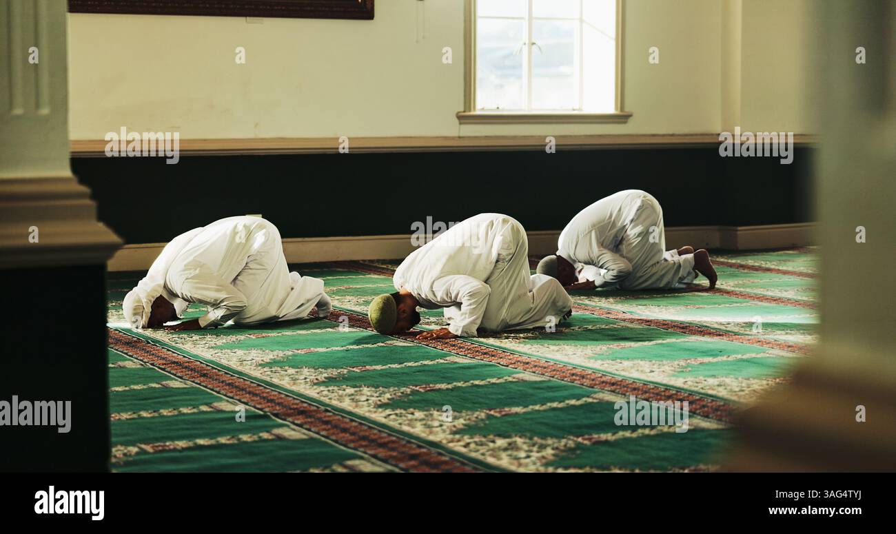 Muslim men, prayer and bow in mosque for religion, worship Allah and ...