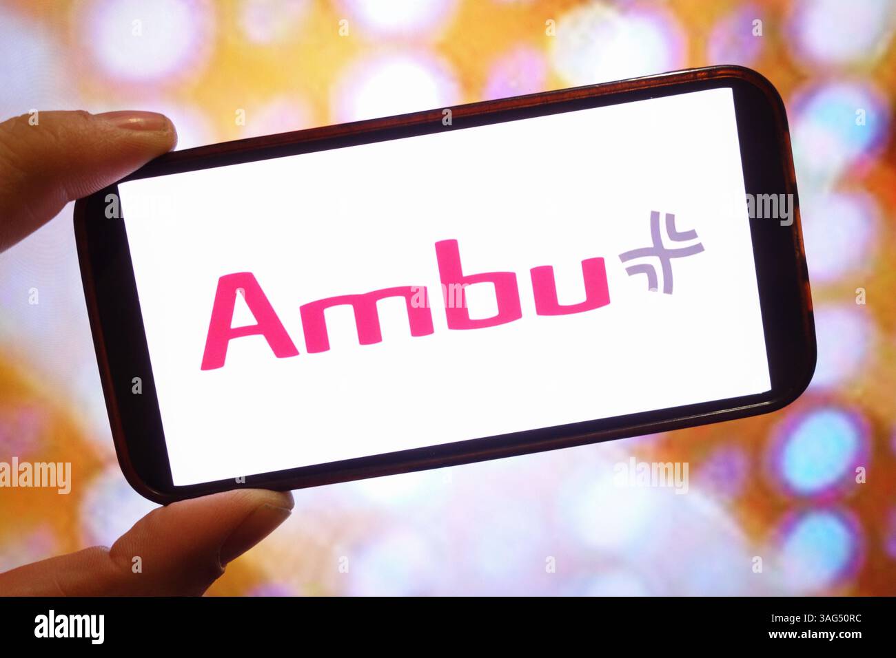 In this photo illustration, the Ambu company logo is seen displayed on ...