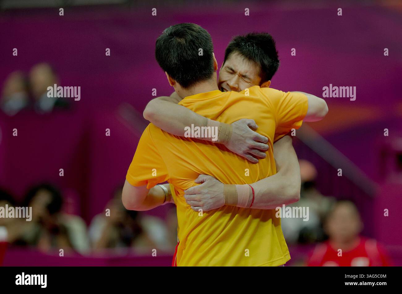 July 30, 2012 - London, England - Zhang Chenglong (CHINA) get a big hug ...