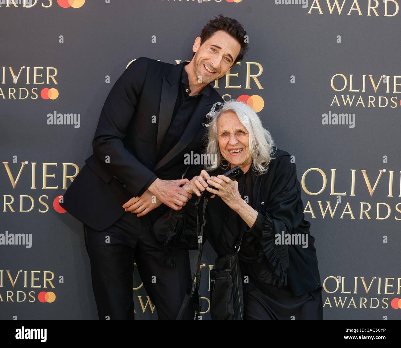 London, UK. 06th Apr, 2025. Adrien Brody and Sylvia Plachy attend the ...