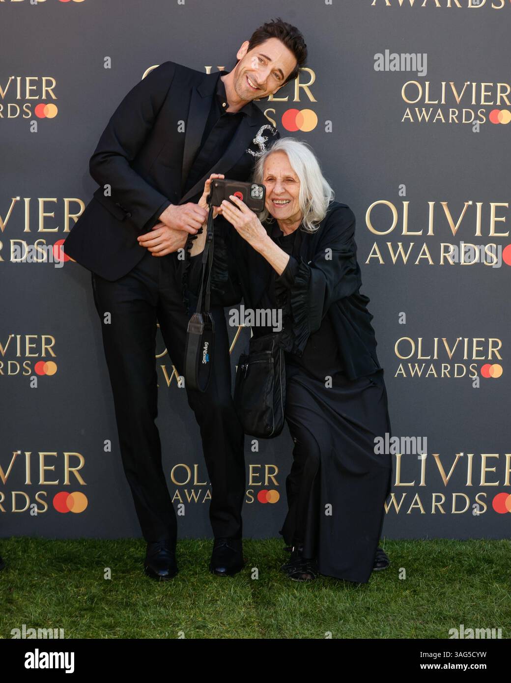 London, UK. 06th Apr, 2025. Adrien Brody and Sylvia Plachy attend the ...