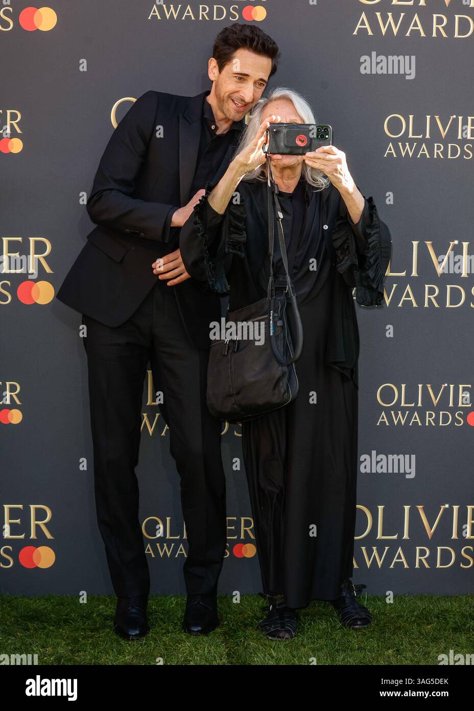 London, UK. 06th Apr, 2025. Adrien Brody and Sylvia Plachy attend the ...