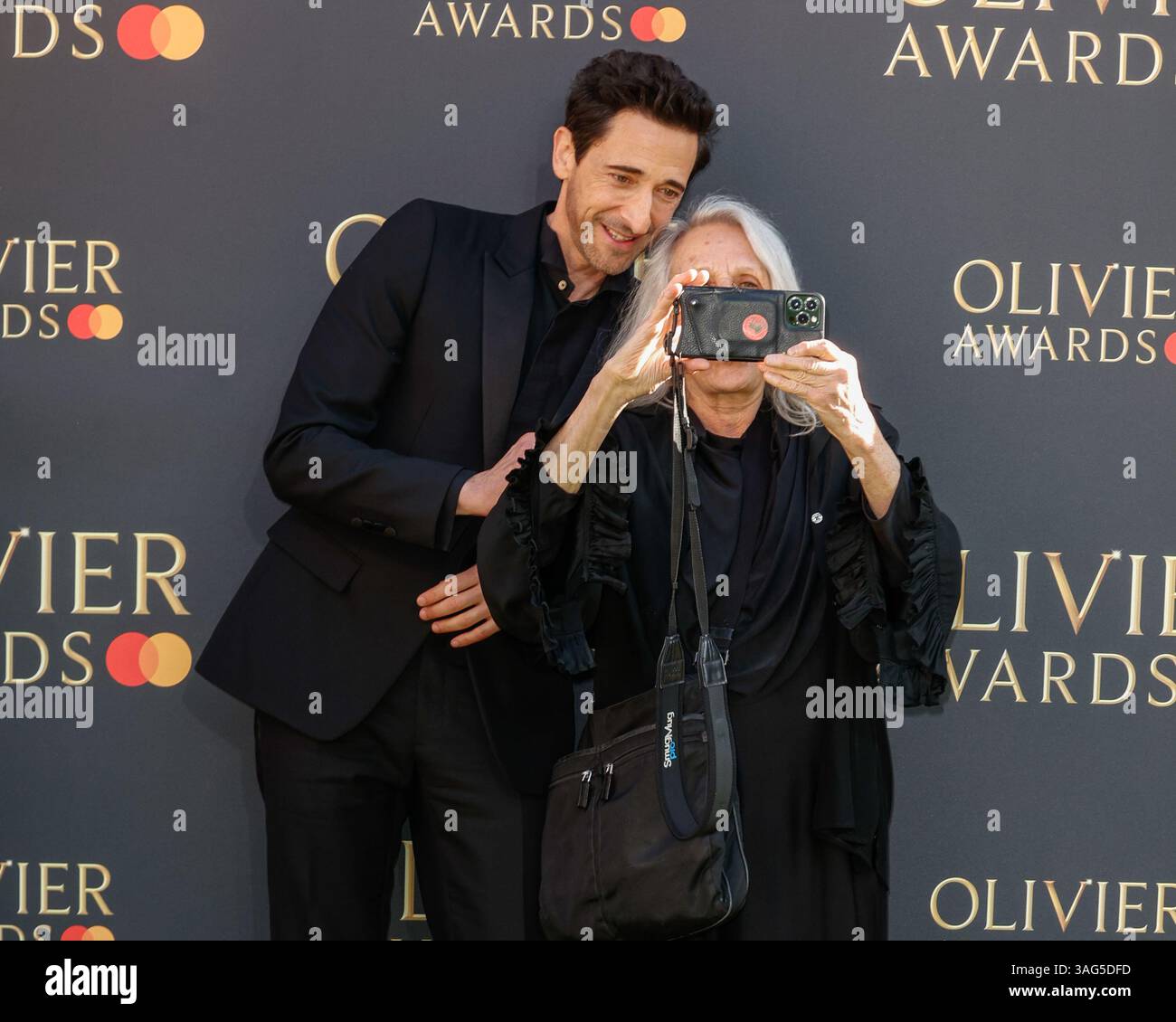 London, UK. 06th Apr, 2025. Adrien Brody and Sylvia Plachy attend the ...
