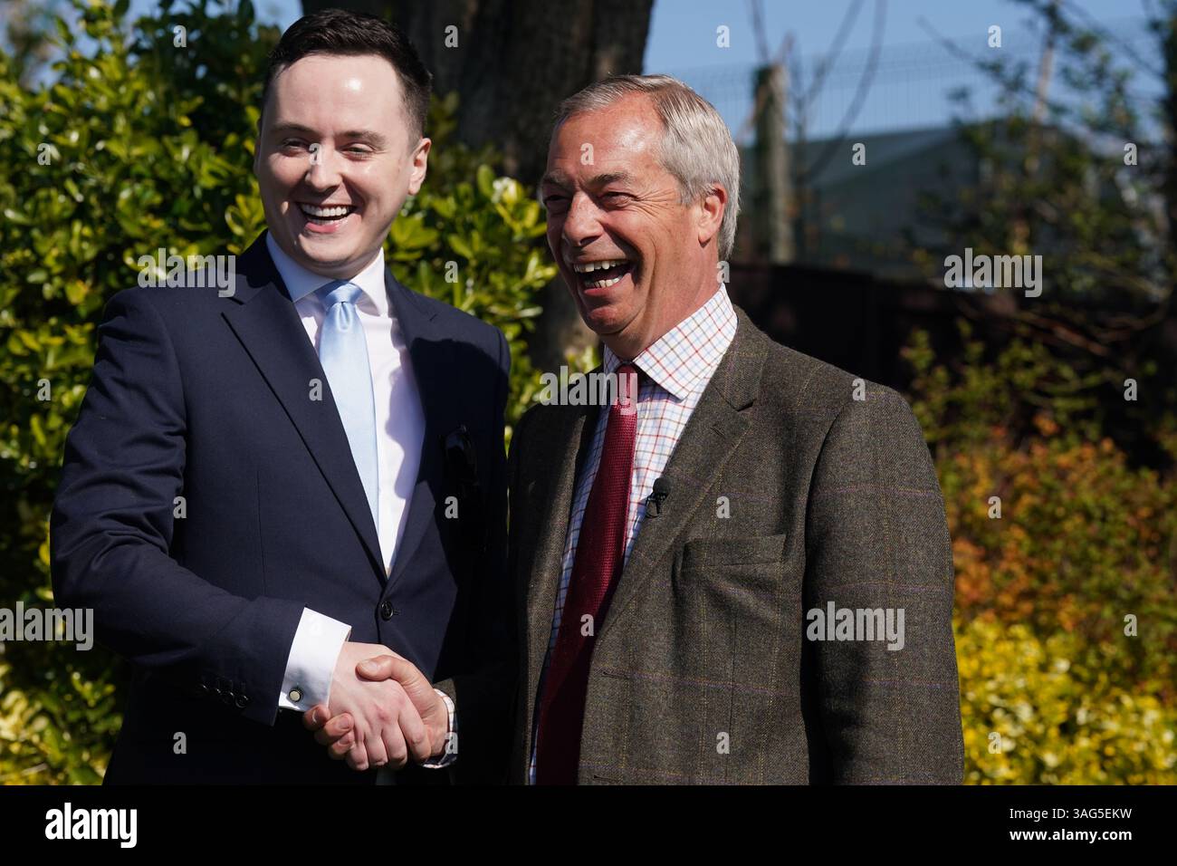 Reform UK leader Nigel Farage (right) and Darren Grimes whilst on the ...