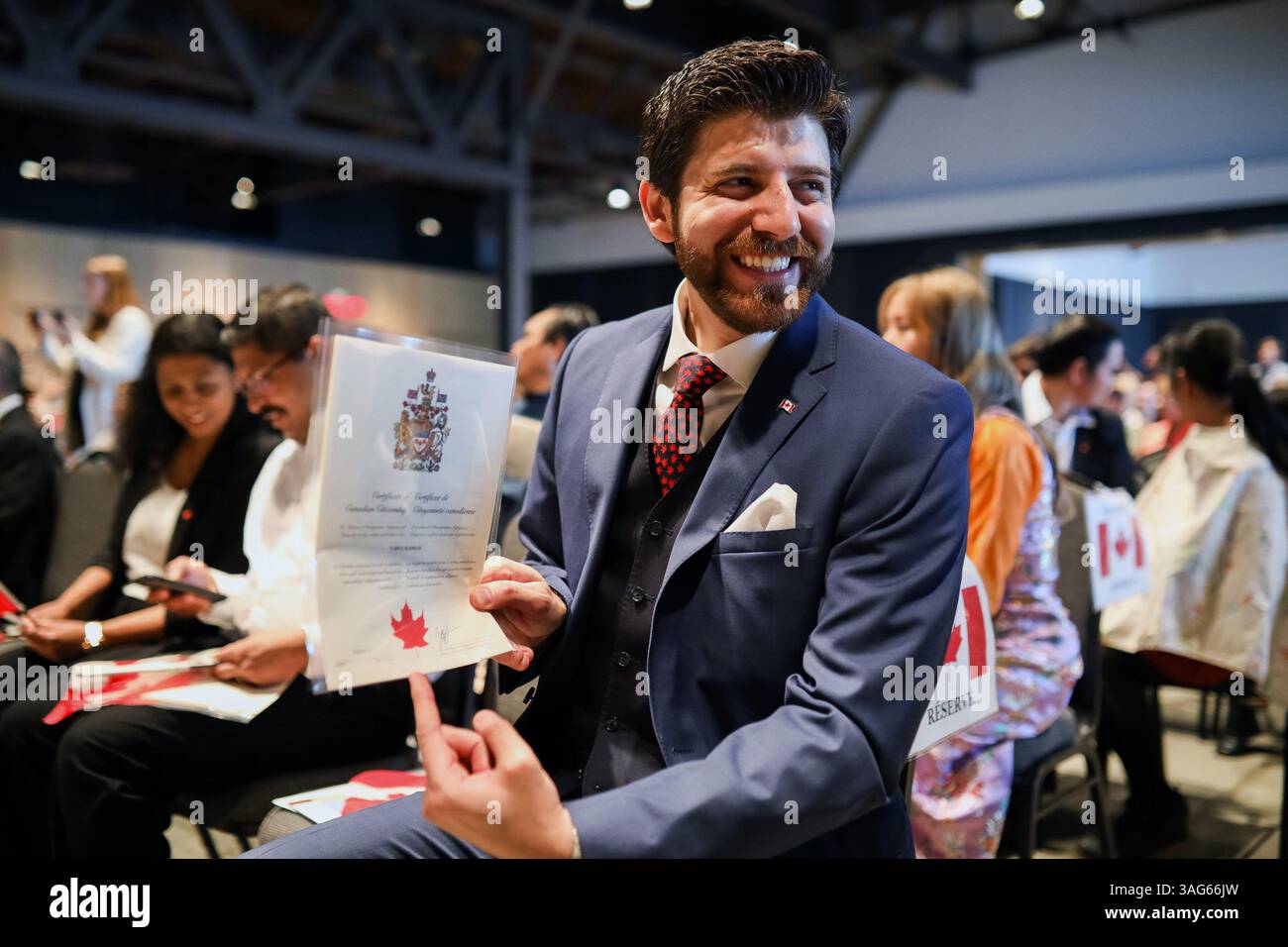 Halifax, Canada. 15th Jan, 2020. Tareq Hadhad holds his citizenship ...