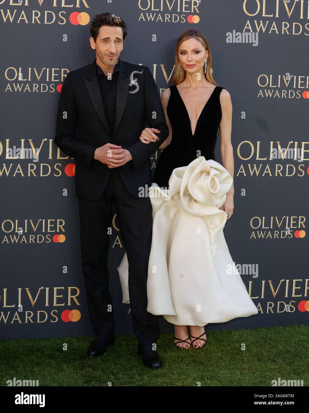 London, UK. 06th Apr, 2025. Adrien Brody and Georgina Chapman attend ...
