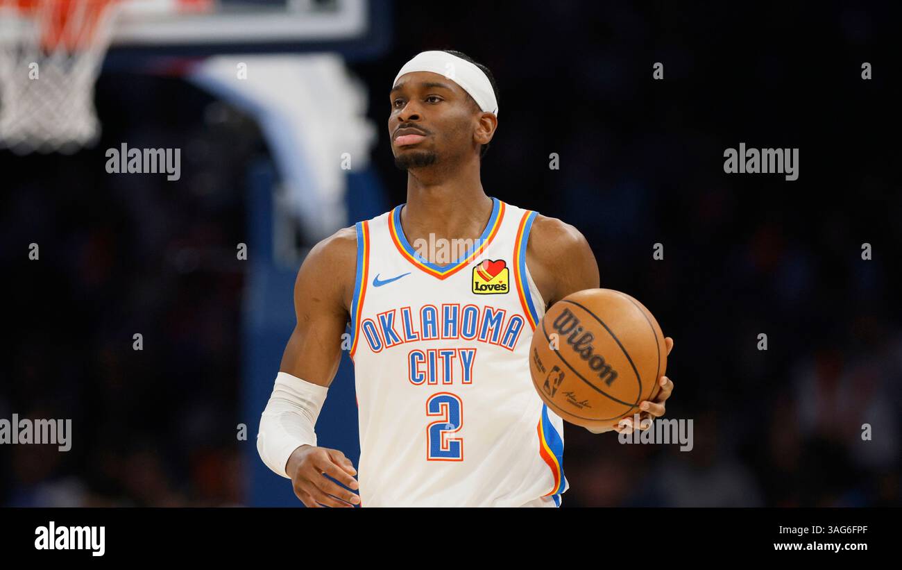 Oklahoma City Thunder guard Shai Gilgeous-Alexander dribbles during the first half of an NBA ...