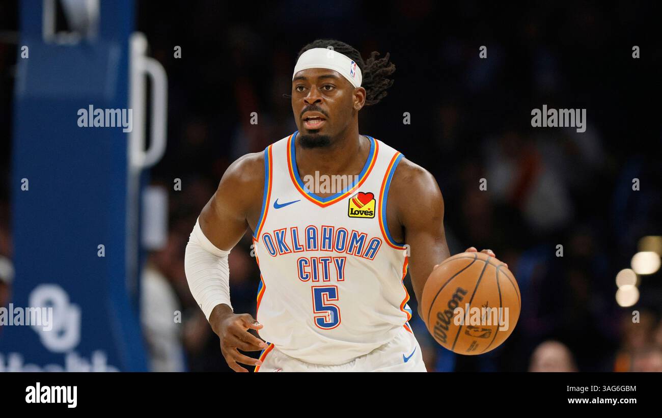 Oklahoma City Thunder guard Luguentz Dort dribbles during the first ...