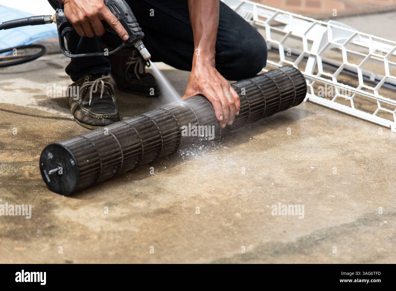 Worker to cleaning coil cooler of air conditioner by water for clean a ...