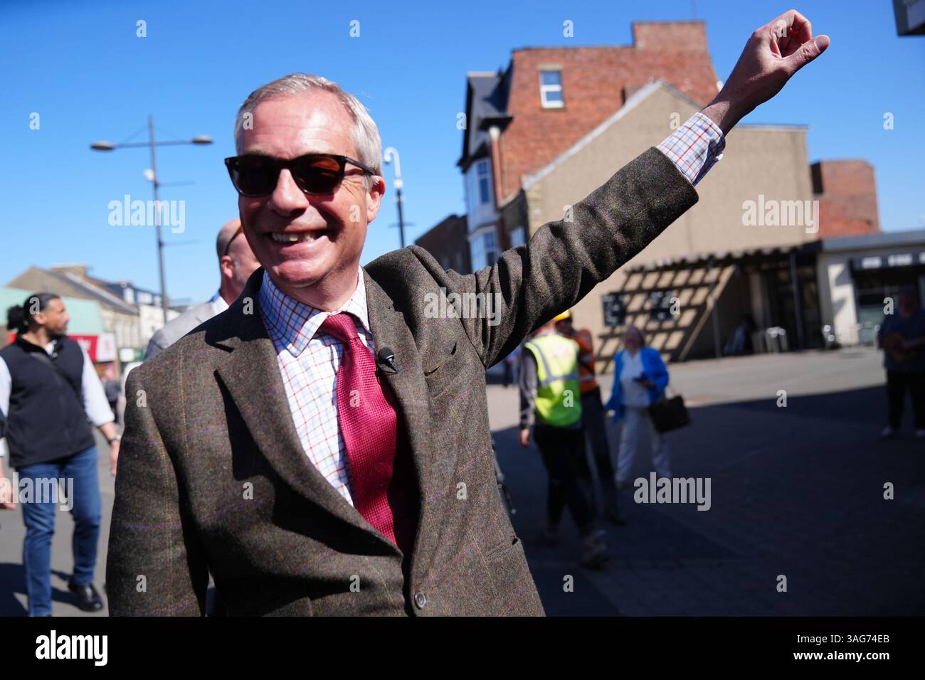 Reform UK leader Nigel Farage gestures whilst on the local election ...