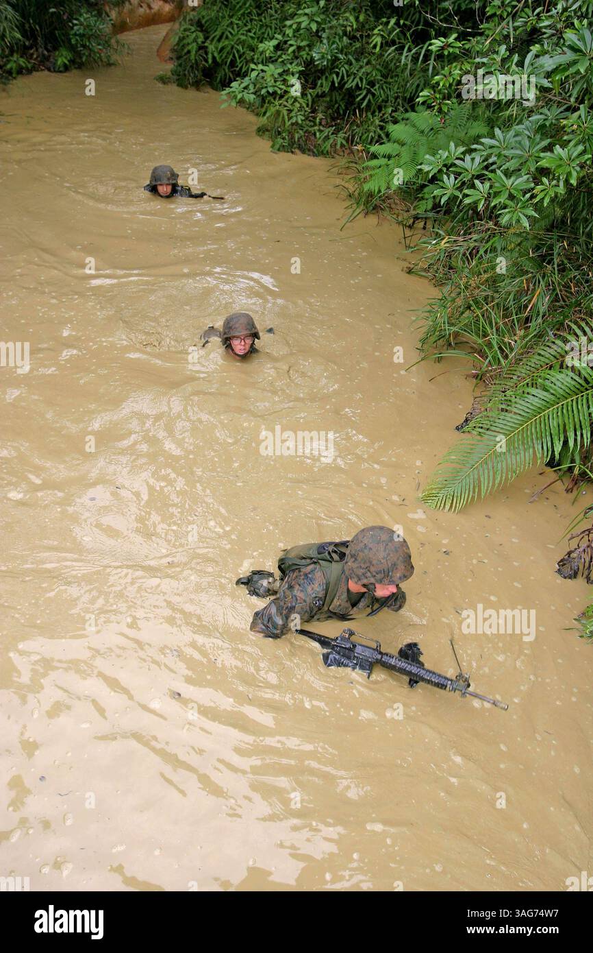Jun 24, 2005 - Okinawa, Japan - U.S. Marines methodically make thier ...