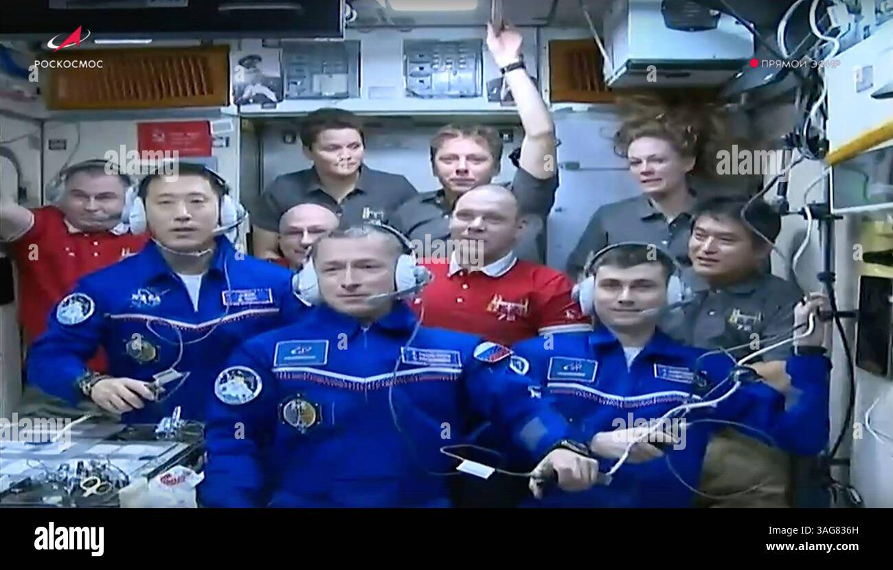 In this photo, taken from video footage released by the Roscosmos Space Agency, newly arrived to ...