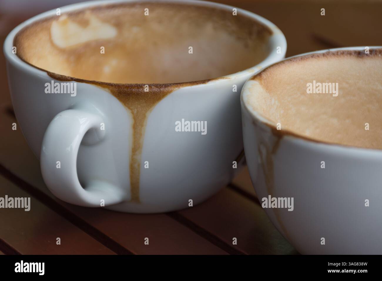 Coffee cup white color empty and dirty after drinking Stock Photo - Alamy