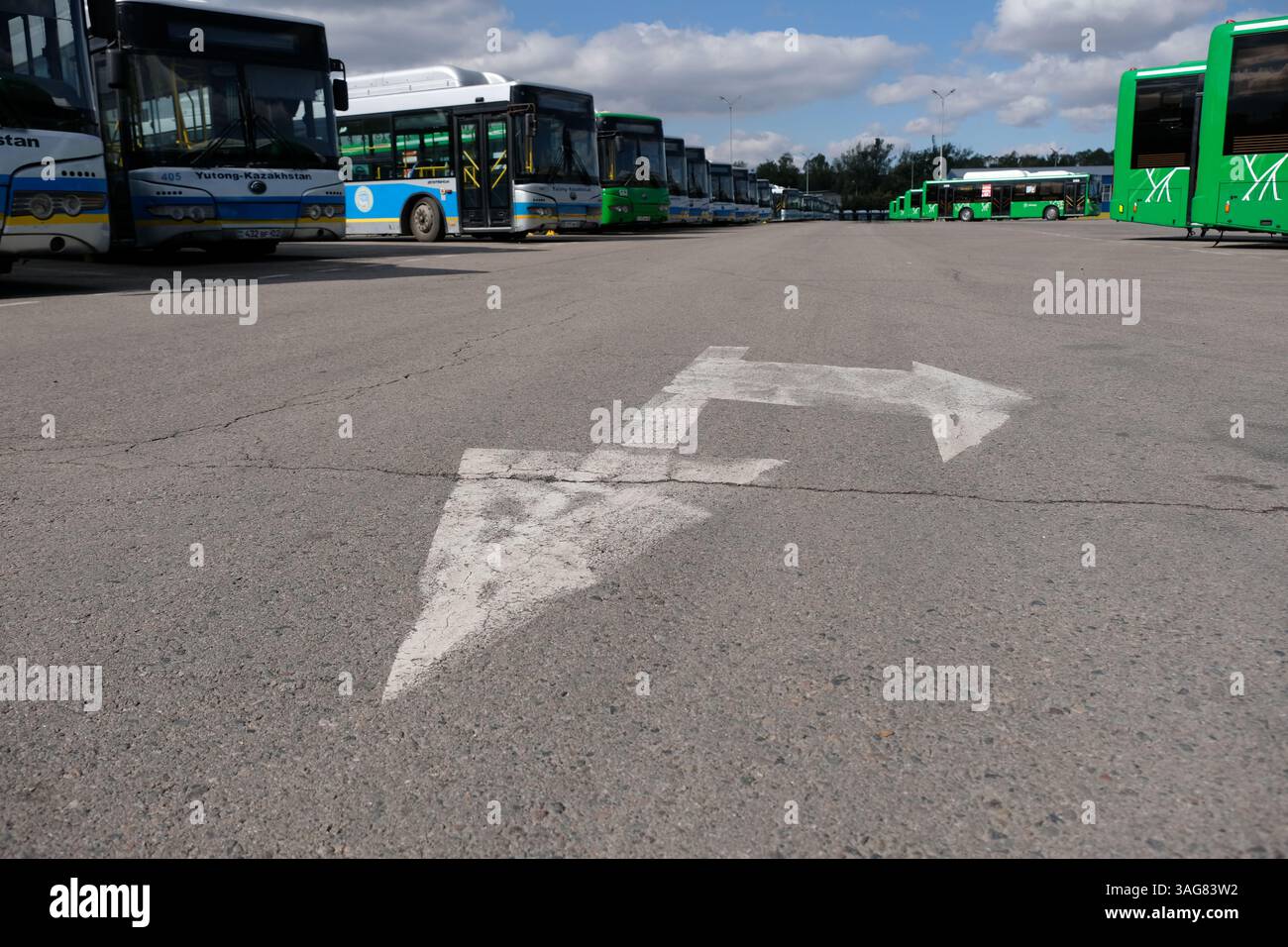 Direction indicator on the ground. Parking for city buses on the ...