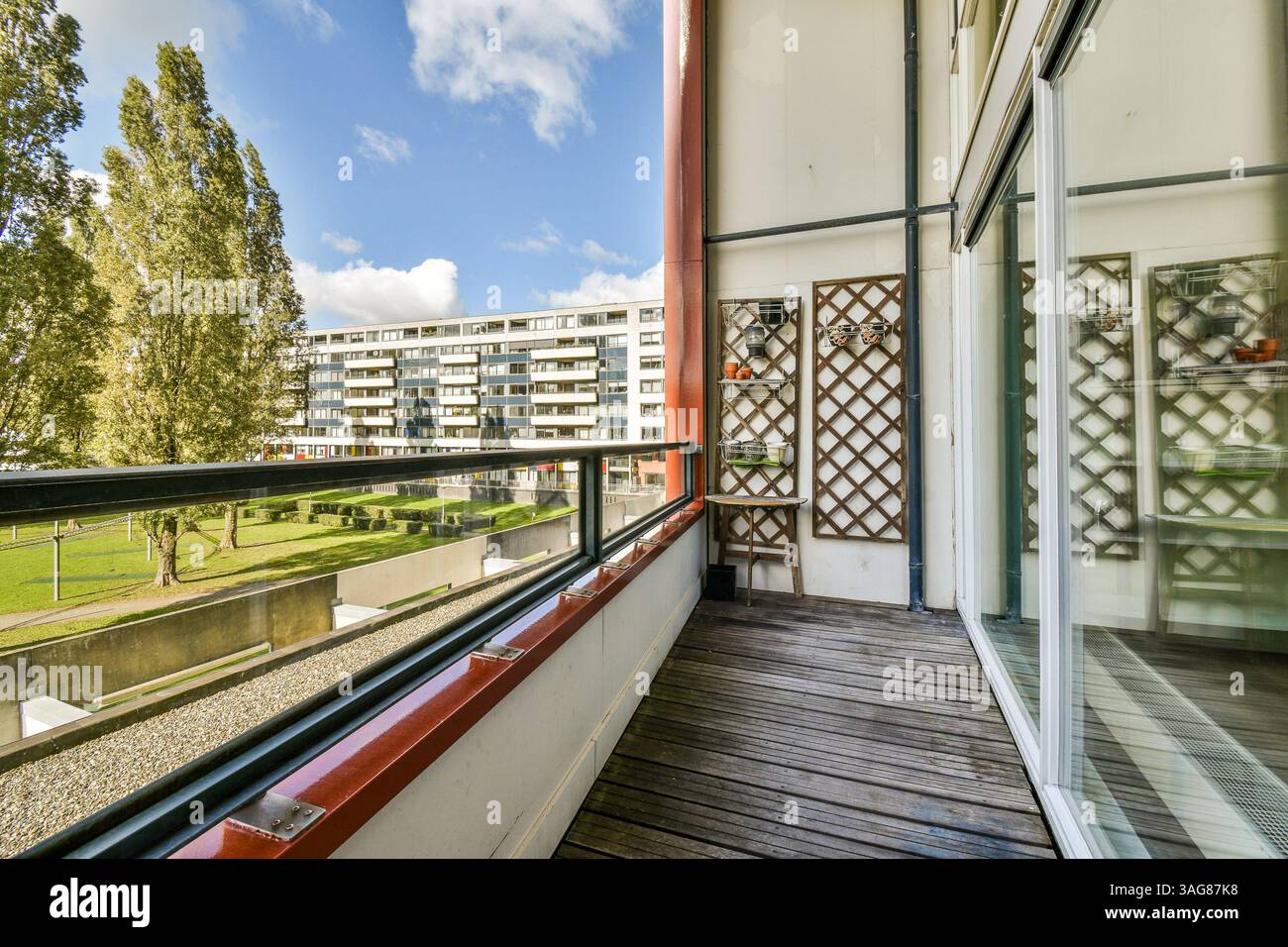 A sleek balcony provides a stunning view of a contemporary residential ...