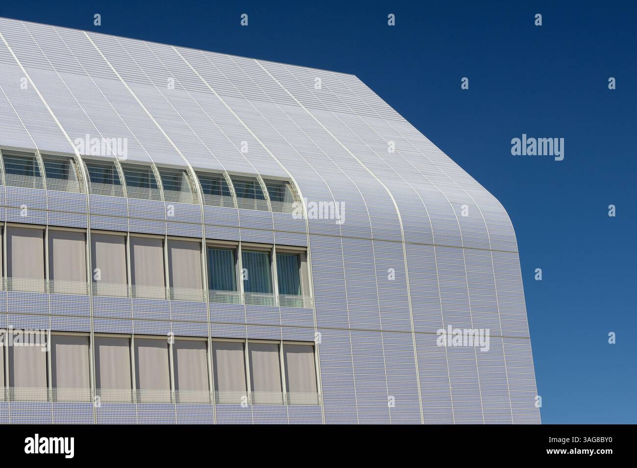 Modern building featuring innovative architectural design with solar ...