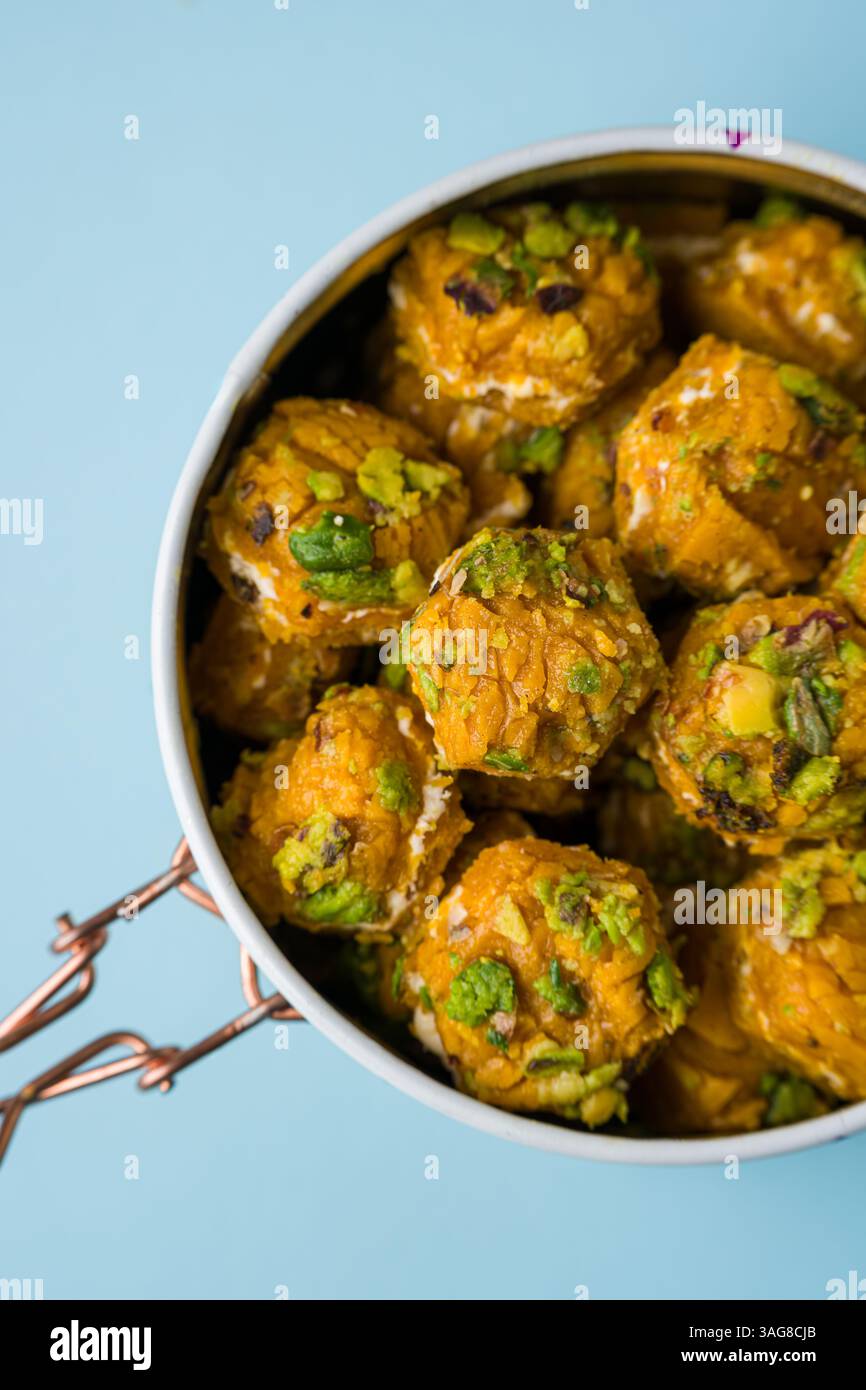 Sohan Dessert, the traditional famous Iranian dessert on a blue ...
