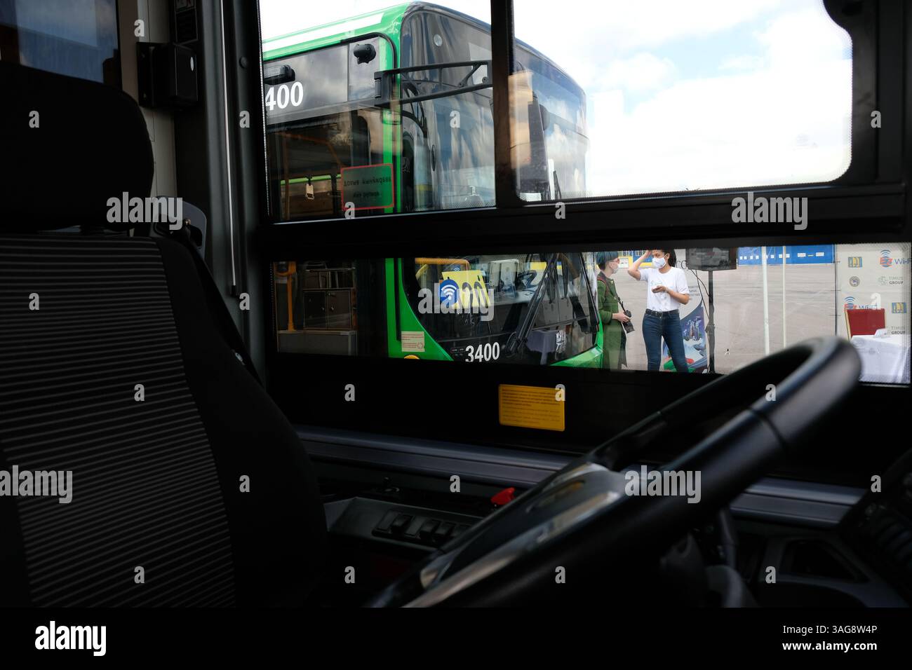 City buses stand behind each other in a large Parking lot of the fleet ...