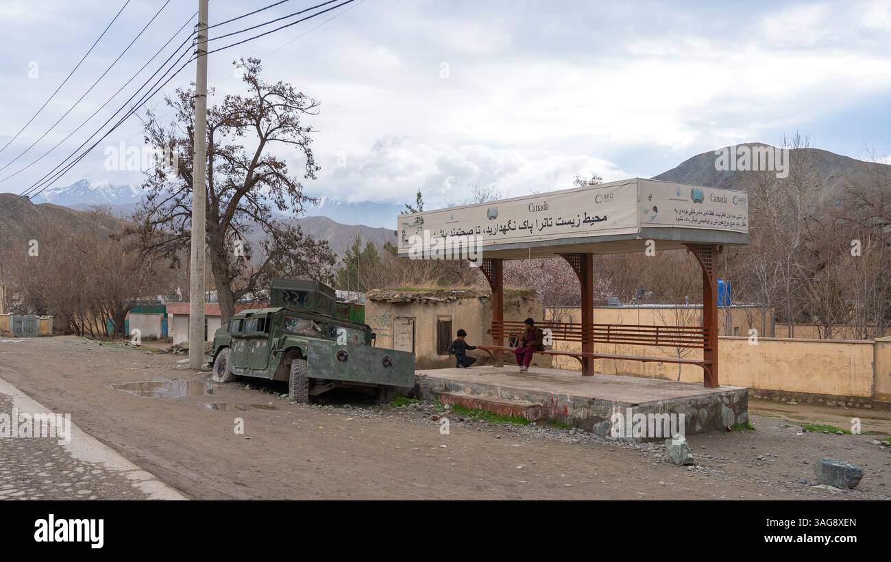 public transport stops and a crashed military vehicle Stock Photo - Alamy