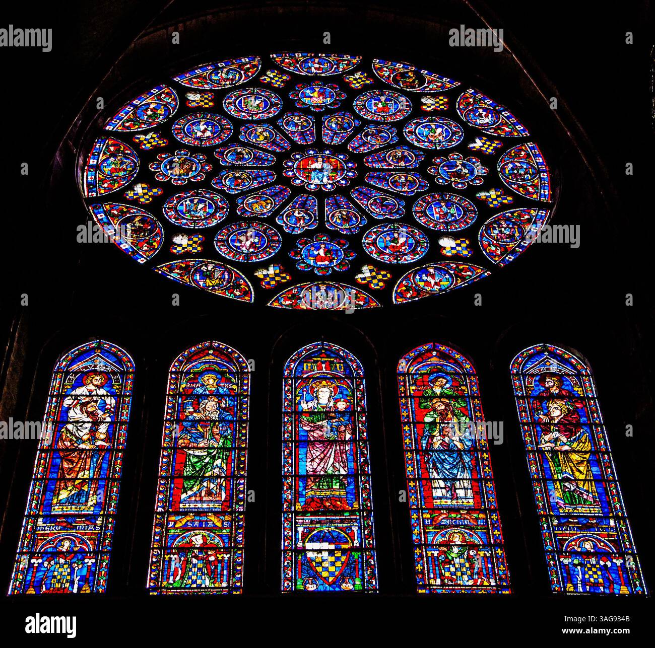 Stained glass rose window in Chartres cathedral. Chartres, France ...