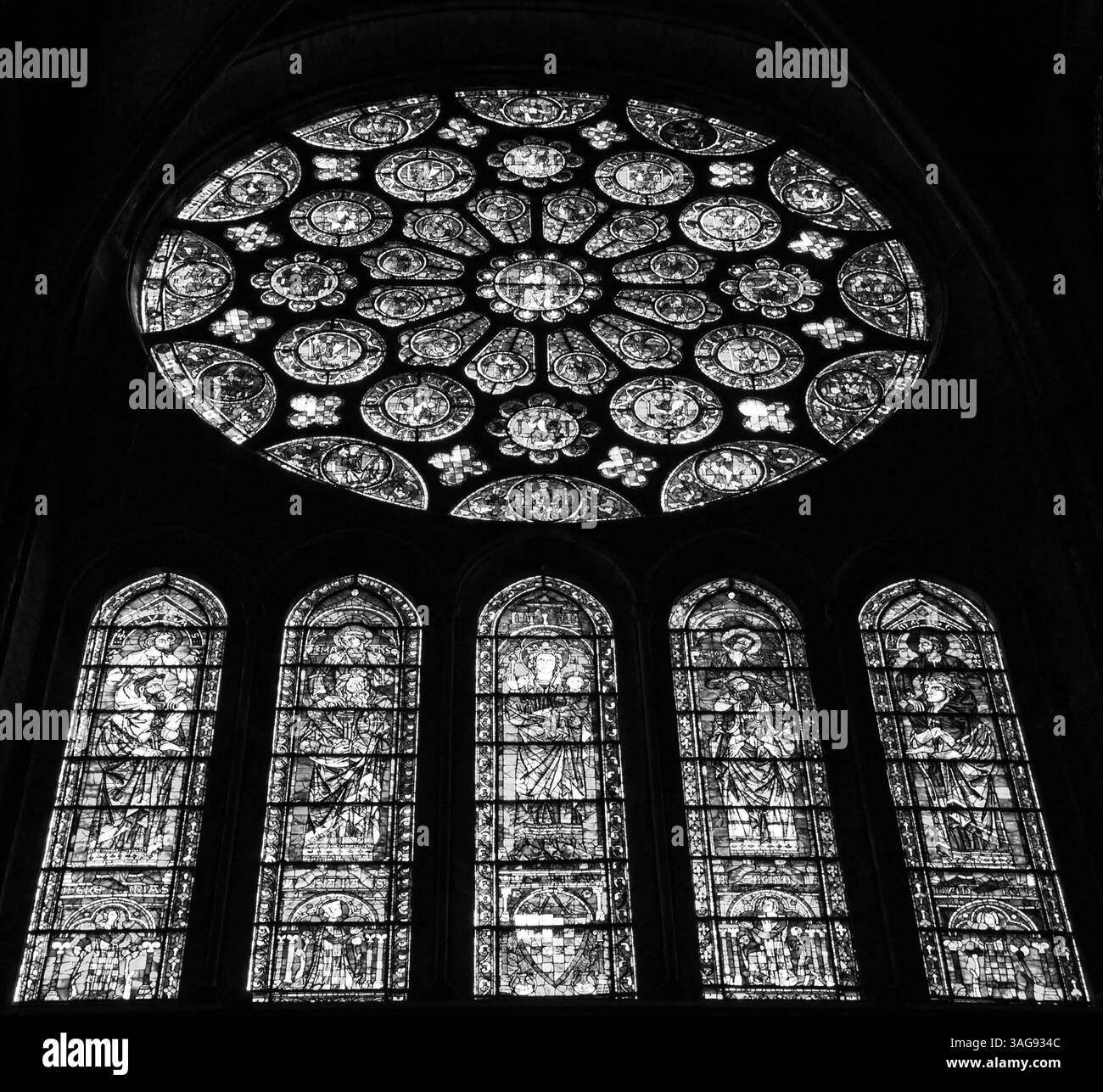Stained glass rose window in Chartres cathedral. Chartres, France ...