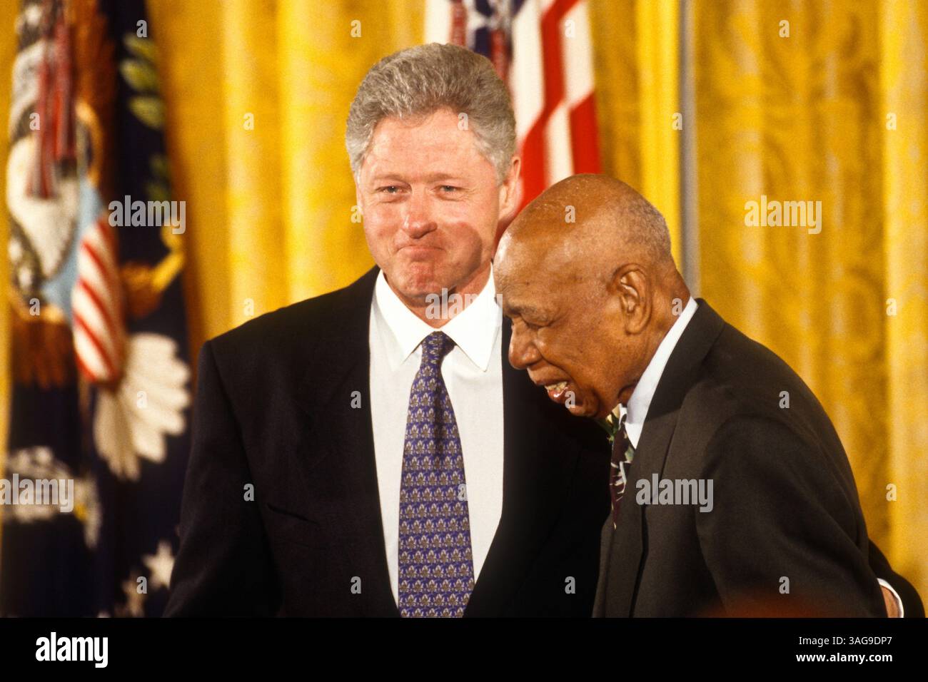 May 16, 1997 - Washington, Dc, DC, USA - President Bill Clinton assists ...