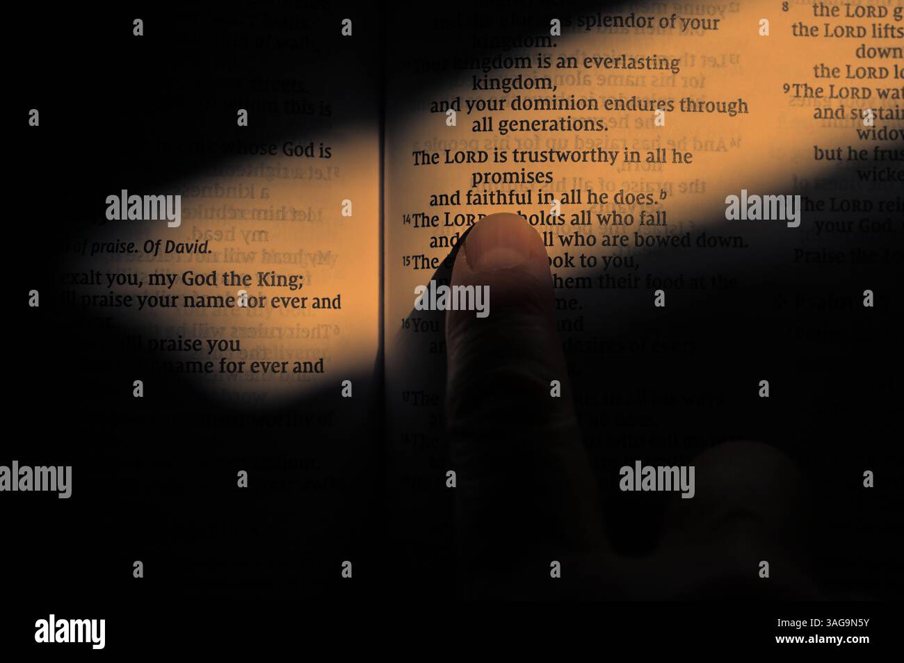 Pointing to the bible hi-res stock photography and images - Alamy