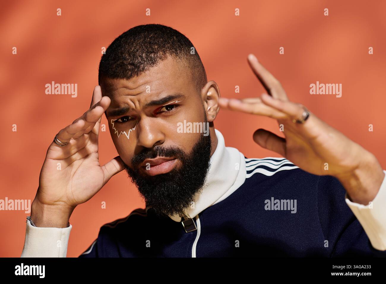 Confident individual poses against a vibrant backdrop, radiating style ...