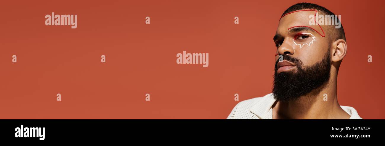 A handsome man exudes confidence while sporting a distinct look against ...