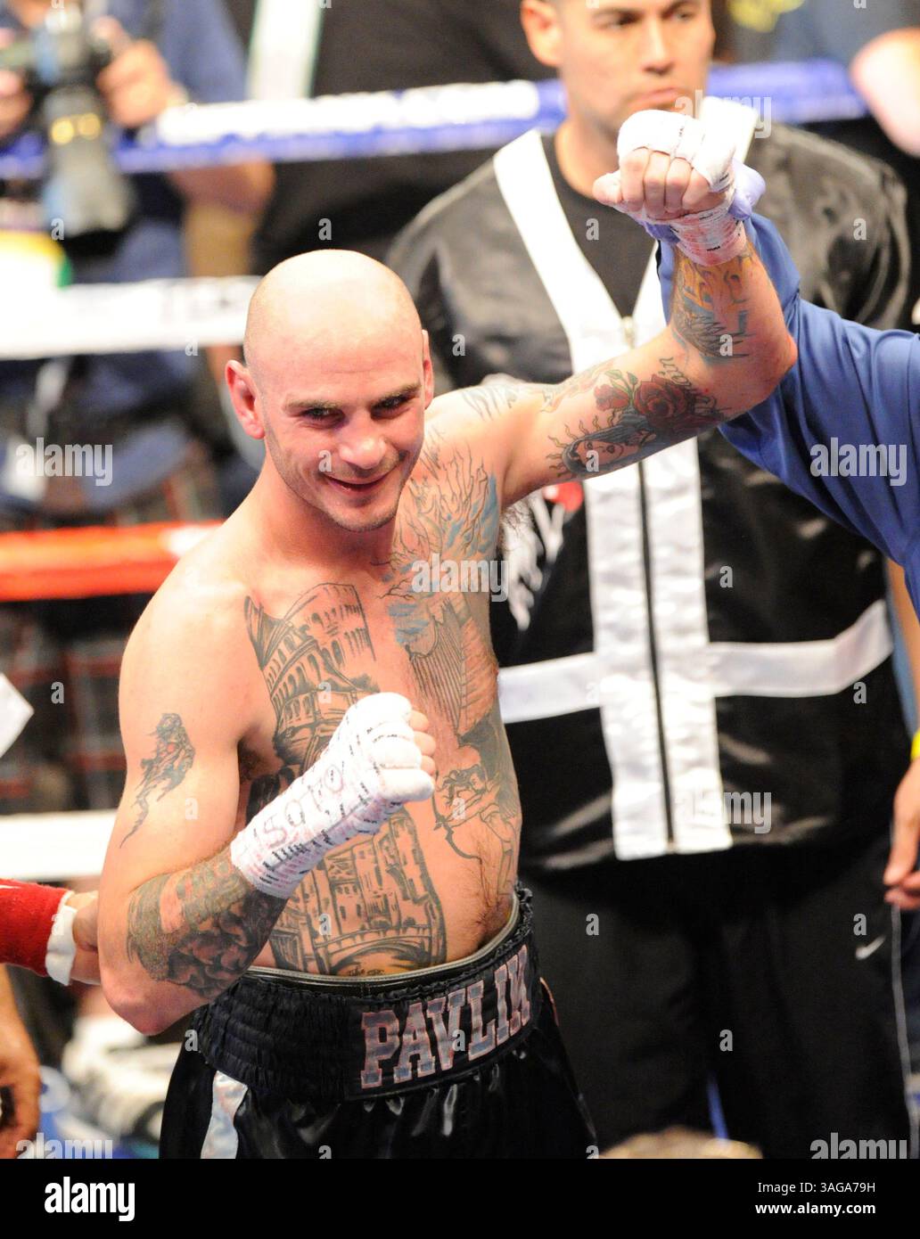 2012 JUN 08: Kelly Pavlik (blue trunks) celebrates his TKO win over ...