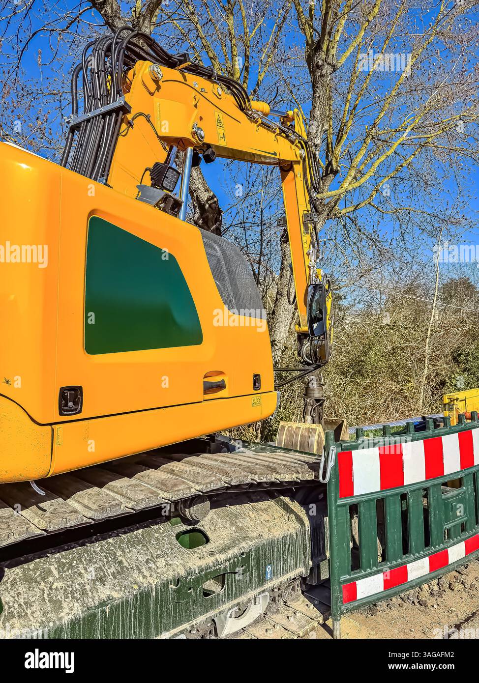 Yellow Excavator at Construction Site, Blue Sky, Heavy Machinery, Urban ...
