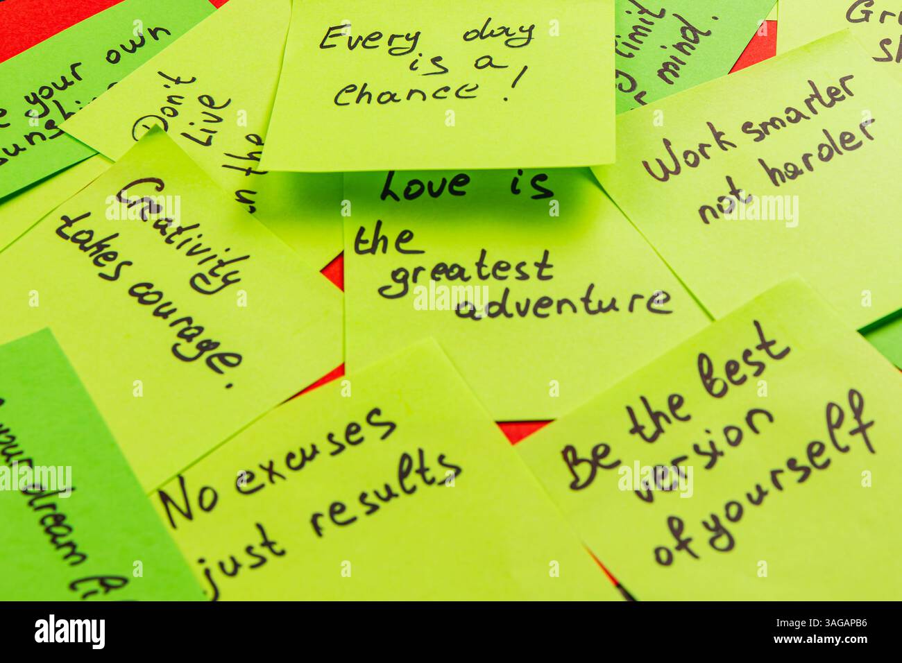 A vibrant collection of sticky notes displays various motivational ...