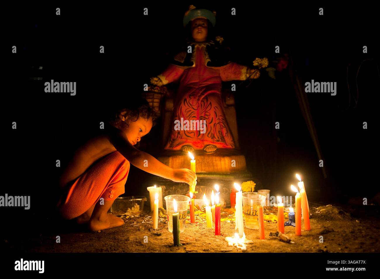 Oct. 11, 2011 - Chivacoa, Yaracuy, Venezuela - A child lights candles ...