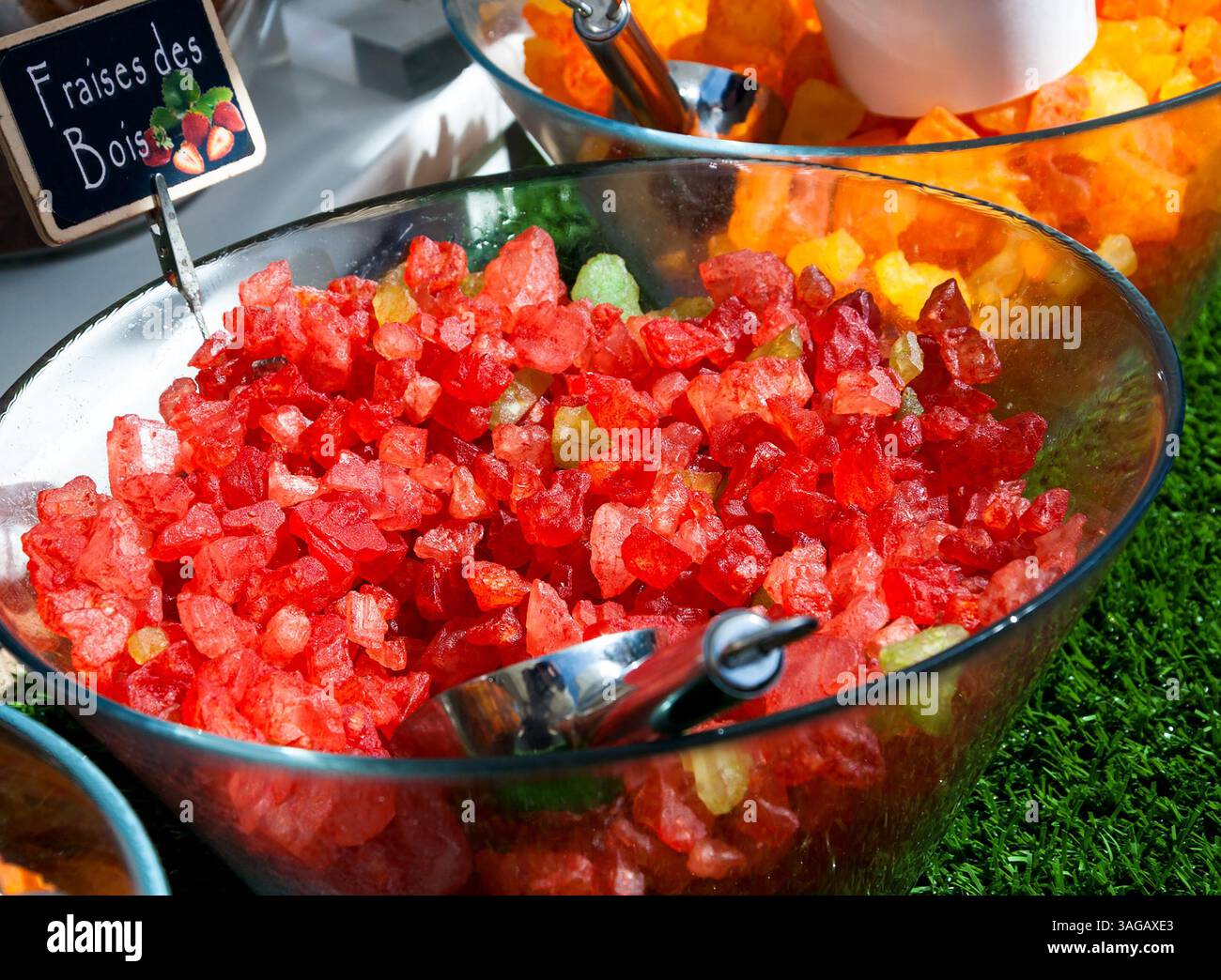 Fruit organic candies in glass bowl for sale at local farmers market in ...