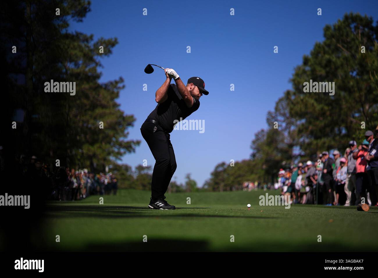 Tyrrell Hatton, of England, hits from the 15th tee during a practice ...