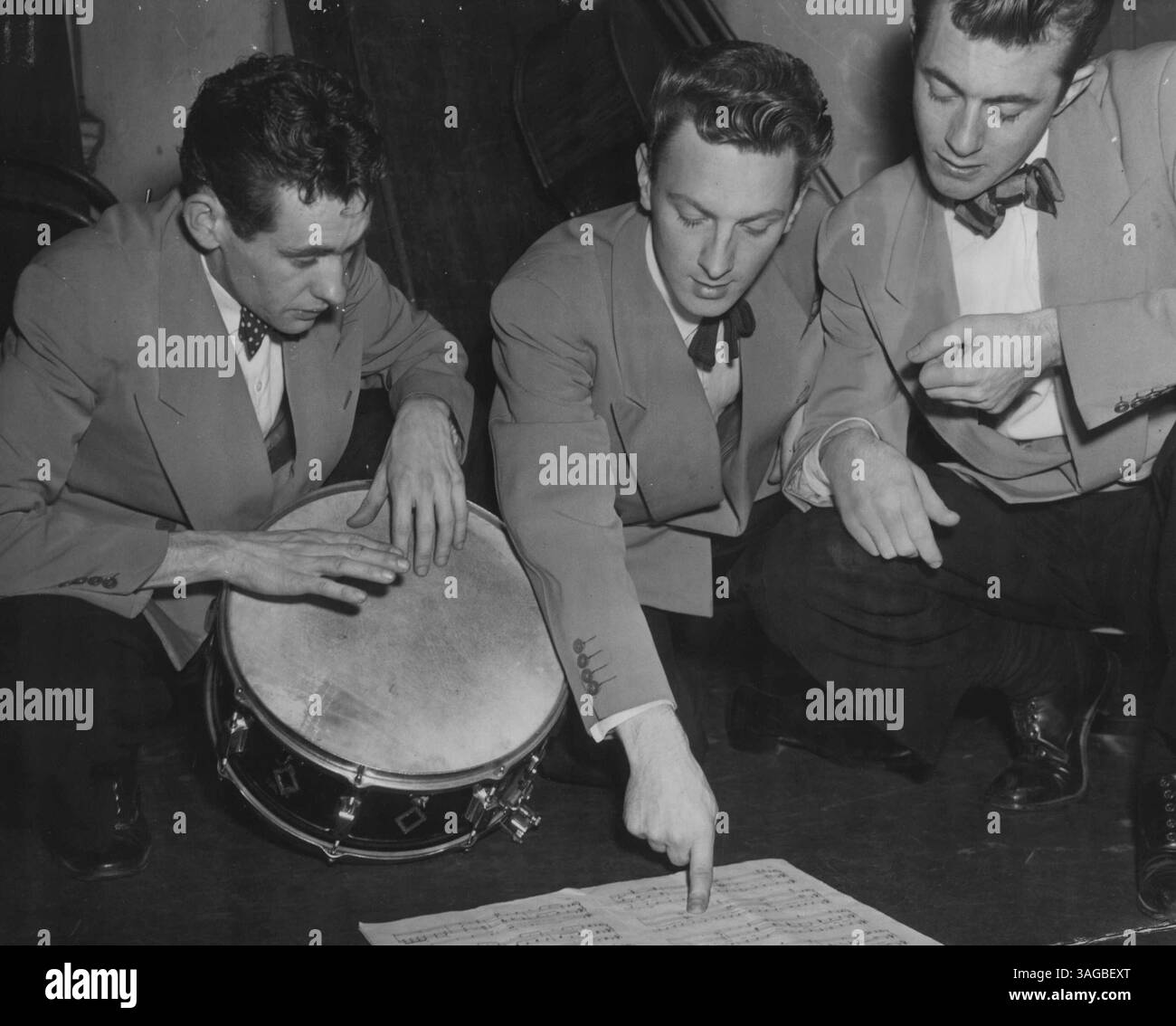Jack Brokenshaw (Left) Trys ant his drum On the floor with Swooner ...