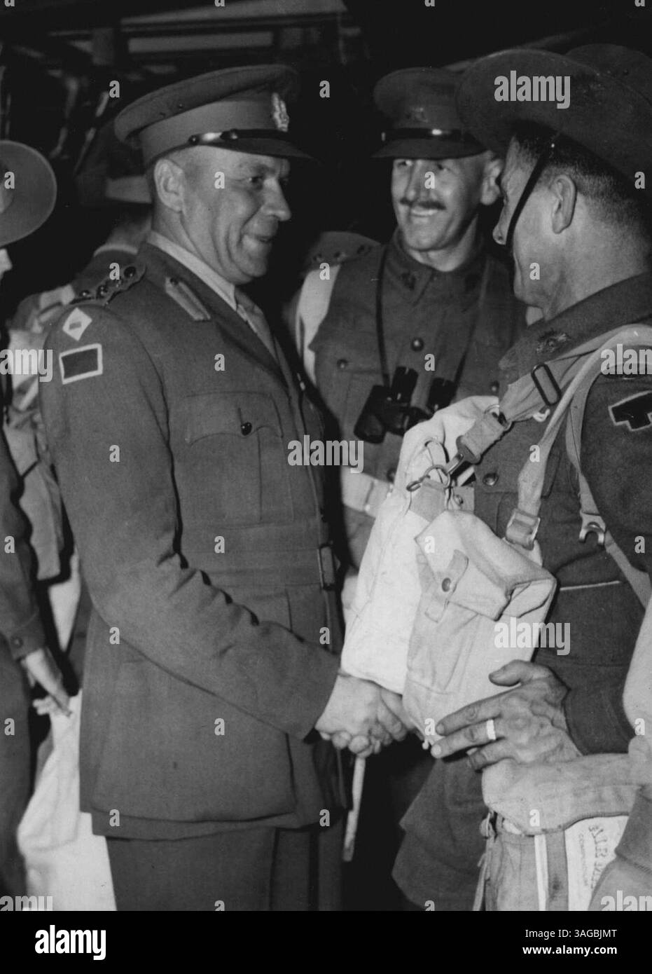 Col. Burrows , who was co, of the 9th division met men of his division ...