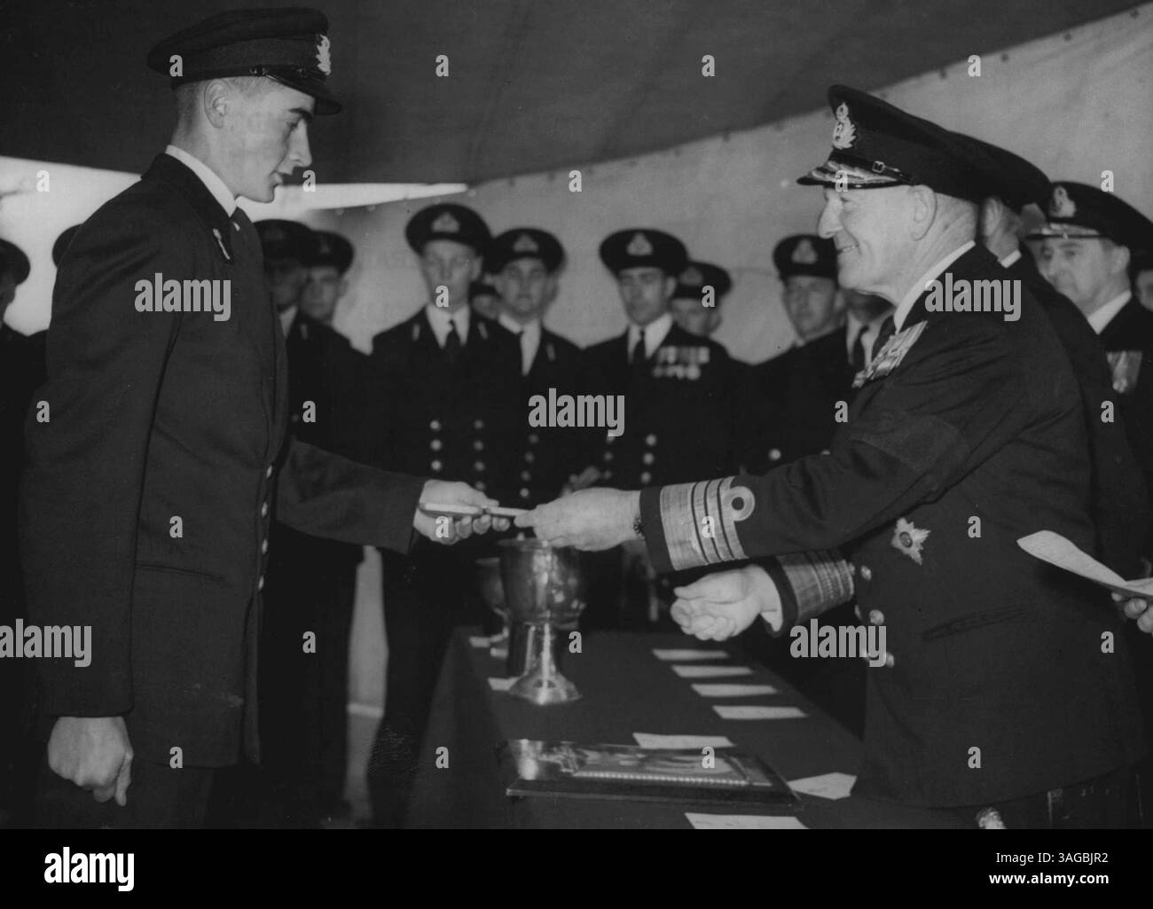 Honour for Australian cadet Admiral Sir Harold Burrough presents the ...
