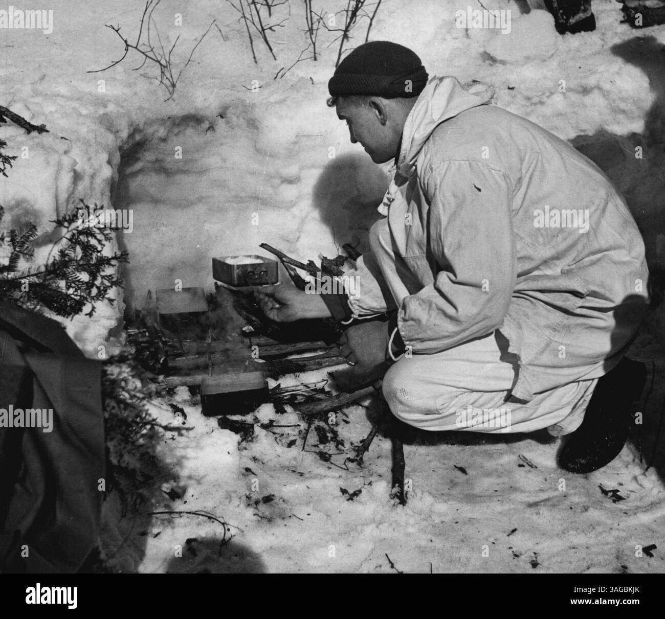 Ski troopers carry heir own rations, cook their own meals. Man pictured ...