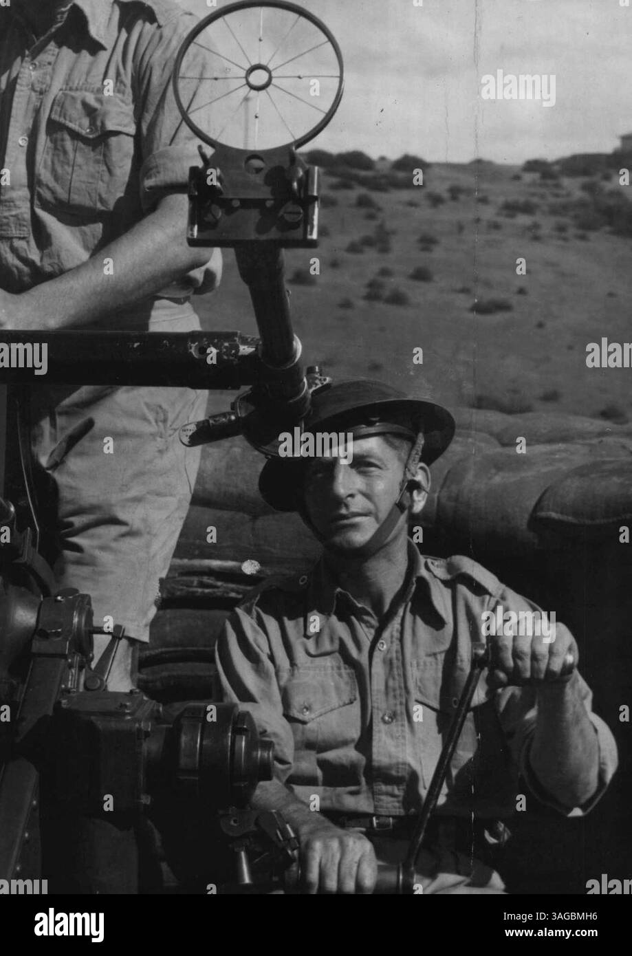 Aiming Before gun over open sights, at an anti-aircraft station in ...