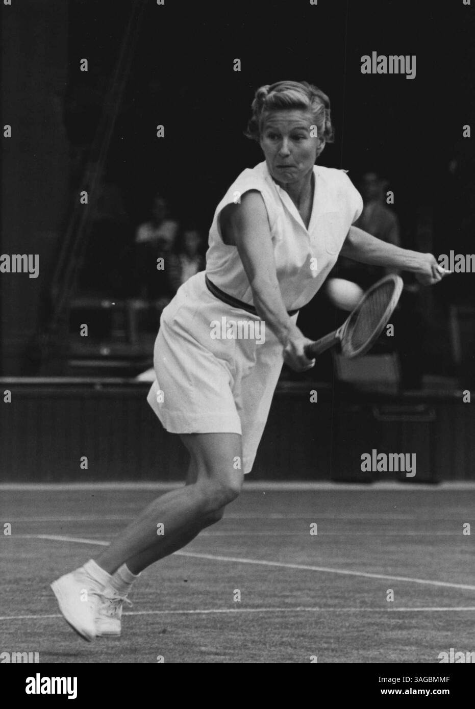 Miss Brough In Action At Wimbledon. Photo Shows: Miss Louise Brough of ...