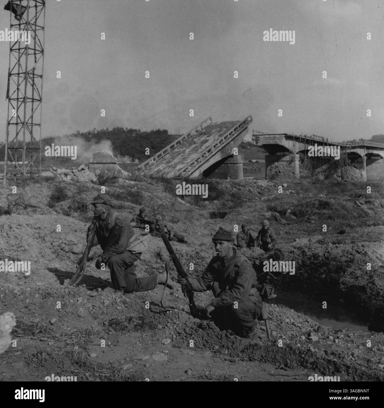 Argylls patrol Tokchongang on the outskirts of Chongju. The bombed ...