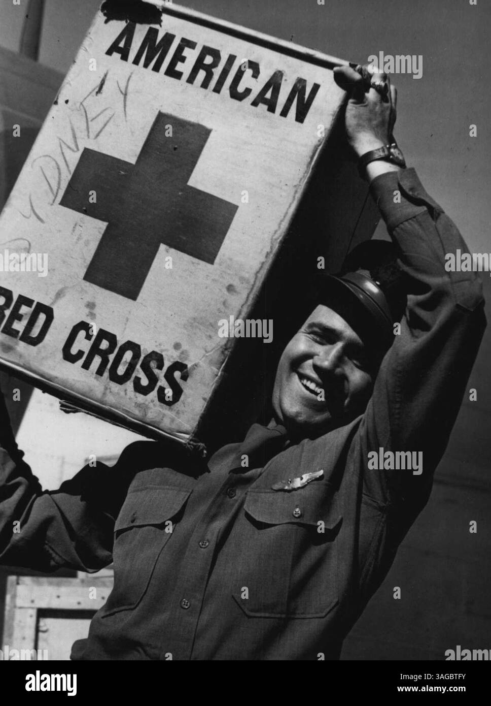 Capt. Fred Dollenberg veteran of Java Campaign carries a Red Cross ...