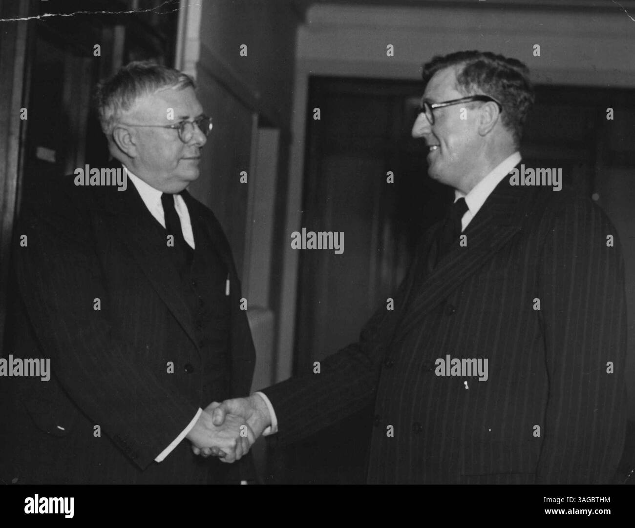 This picture shows: Dr. Evatt and Mr. Calwell congratulating each other ...