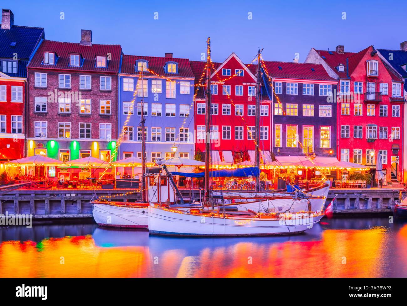 Copenhagen, Denmark. Nyhavn. iconic water canal in colorful morning ...