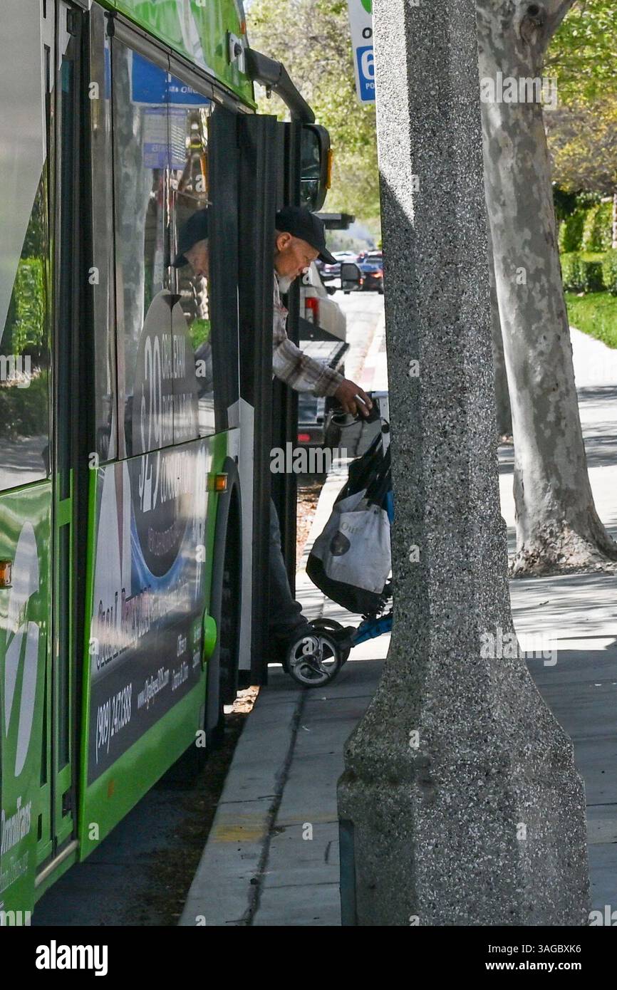 John Mendes gets off the a route 61 Omnitrans bus in Pomona as it is ...