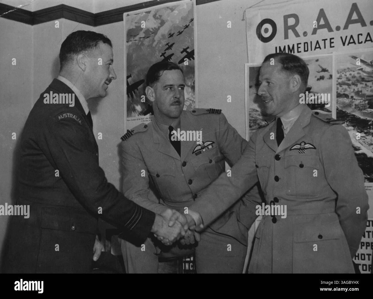 Flying Brothers Meet In Sydney. Squadron..Leader E.B. Waddy, RAF, (left ...