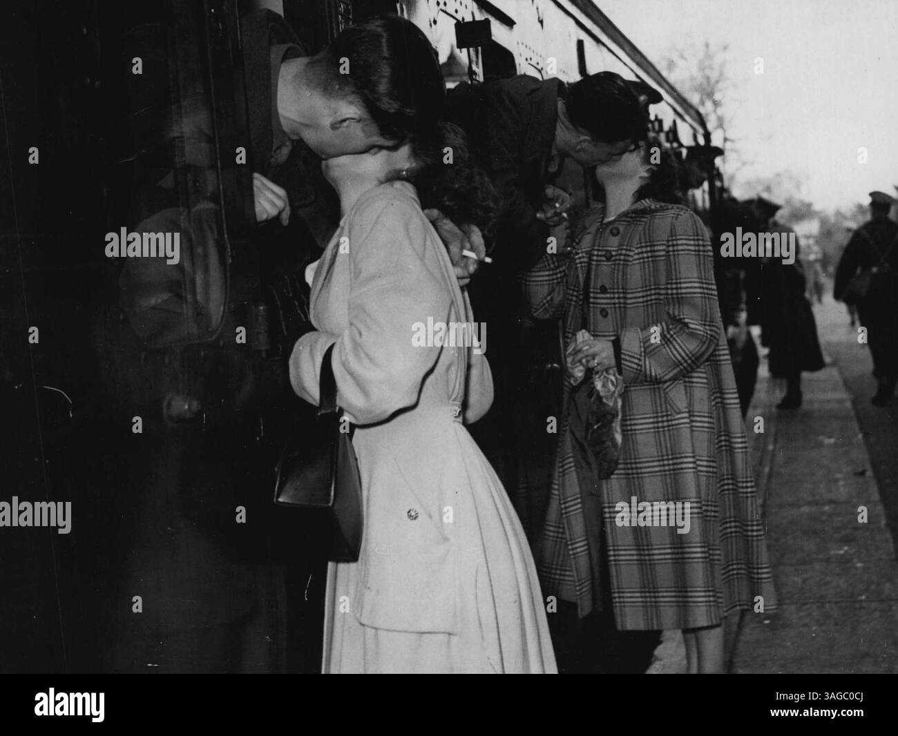 Station Farewell -- Giving her fience, Guardsman Ron Shanks, a farewell ...