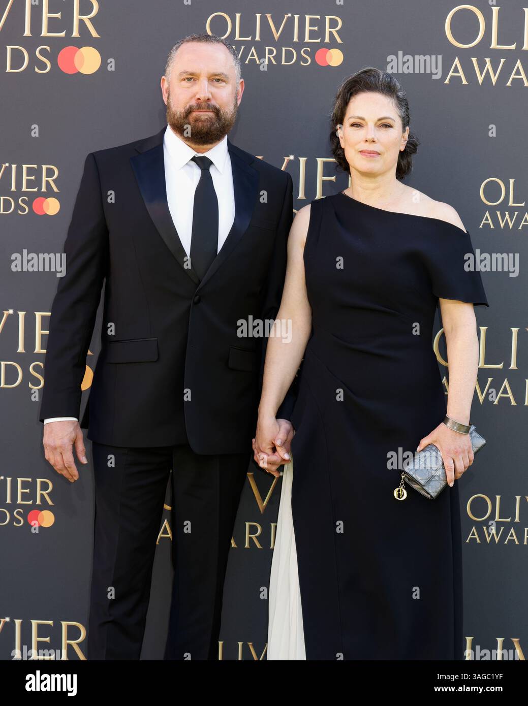 Adam Dannheisser and Jen Dannheisser attend the Olivier Awards 2025 at ...