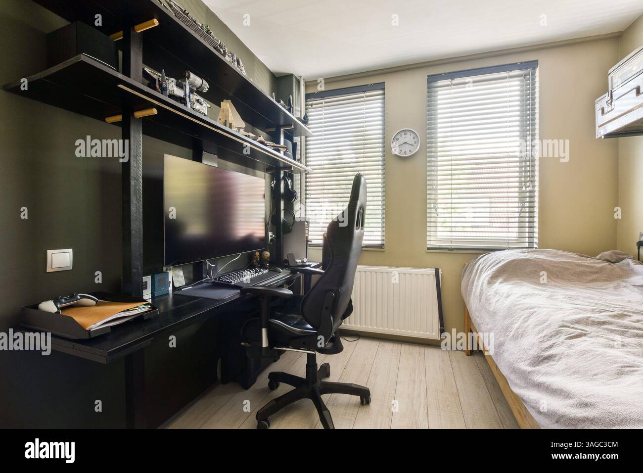 A sleek and modern home office setup featuring a computer workstation ...